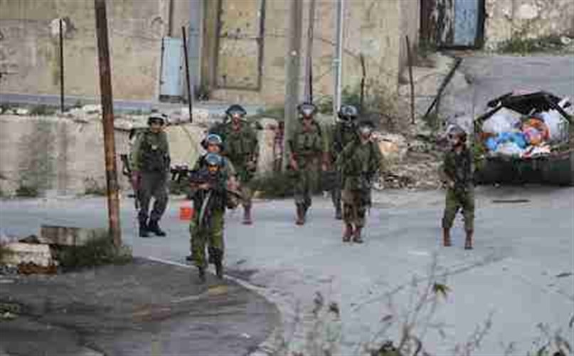 A Camera’s View Finder Confronts a Gun Sight