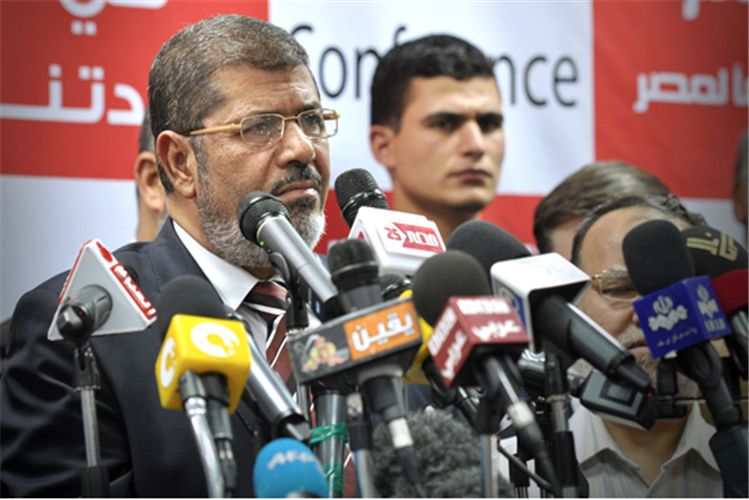 Egypt's President Morsi in Power: A Timeline